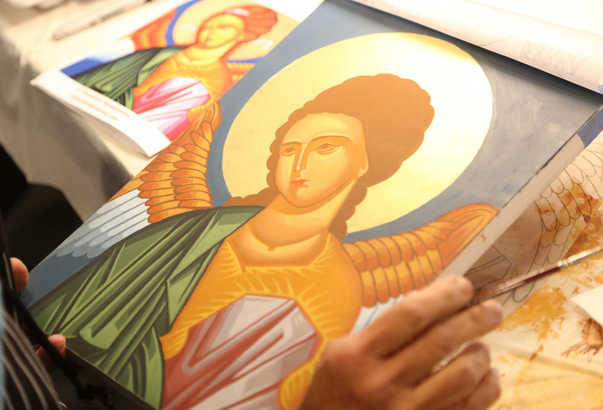 His art is a way of 'meeting with the divine,' iconographer says