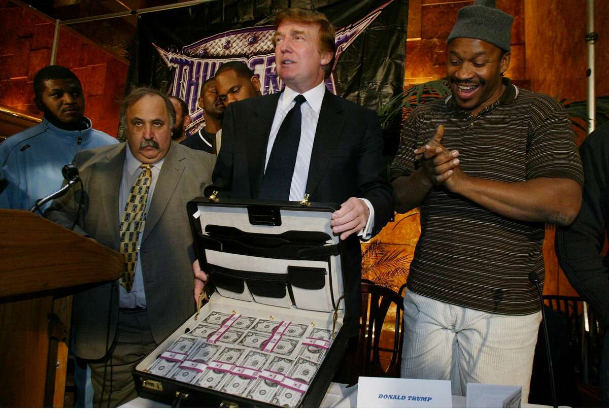 George Foreman calls Donald Trump critics 'sore losers'