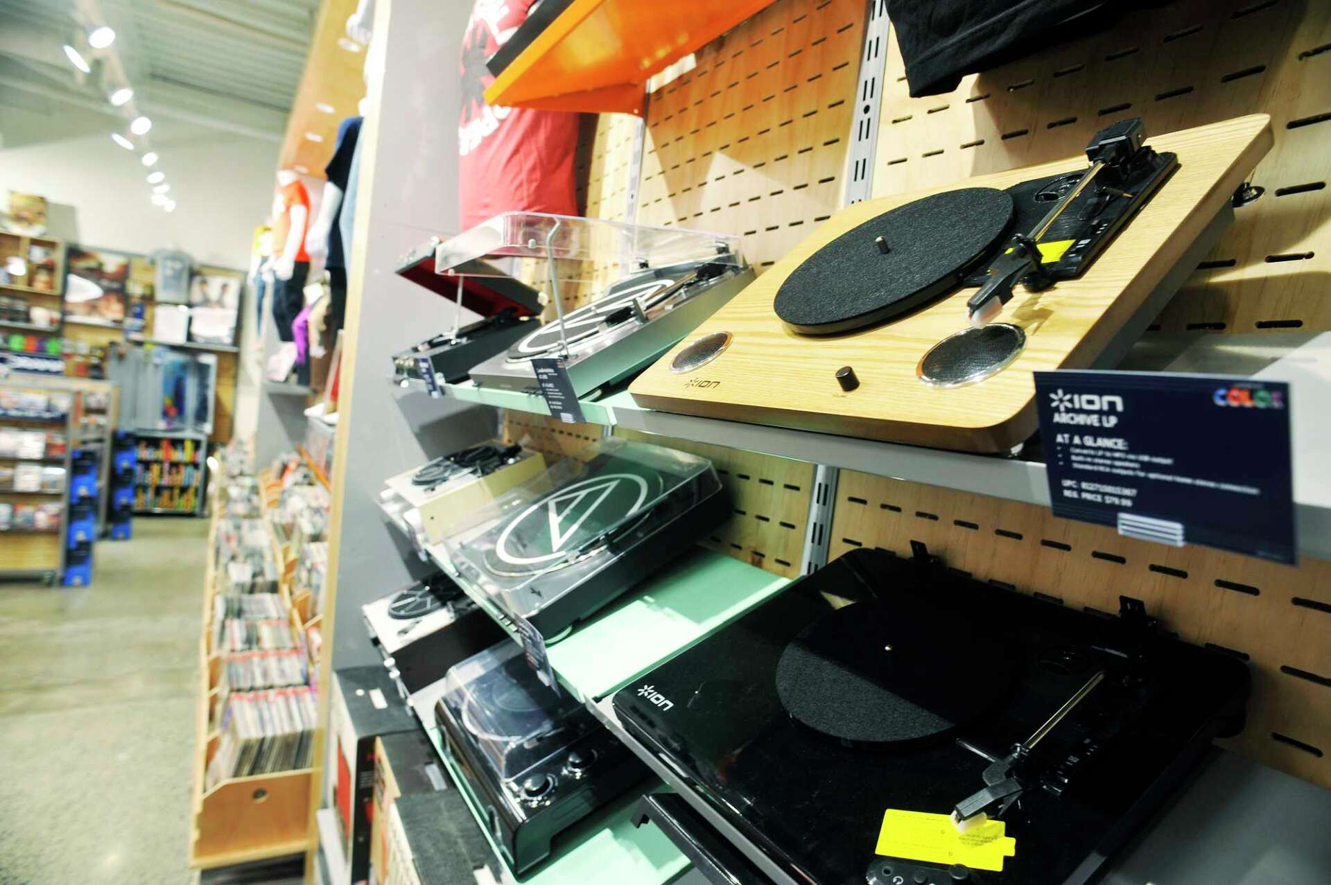Young people fueling resurgence of vinyl records, cassettes