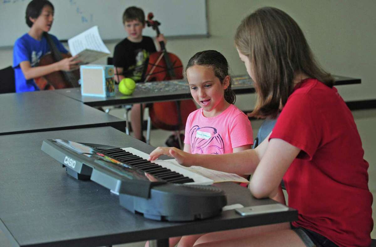 Students explore ‘Roots of Music’ at Comstock Community Center
