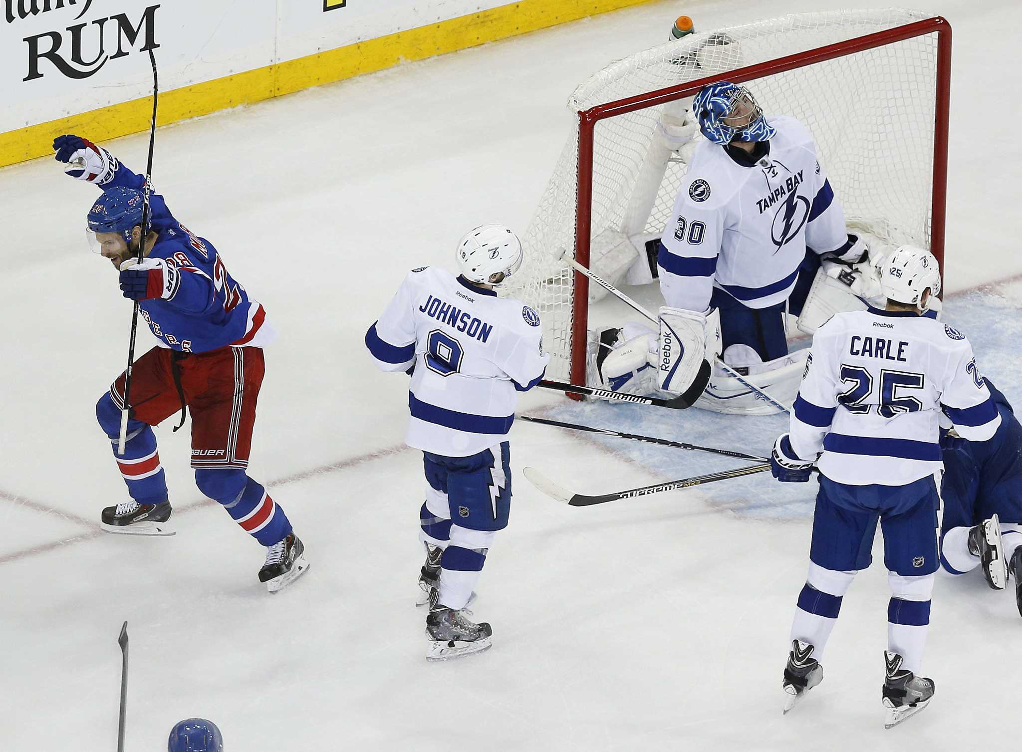 Dominic Moore scores late, Rangers beat Lightning in Game 1