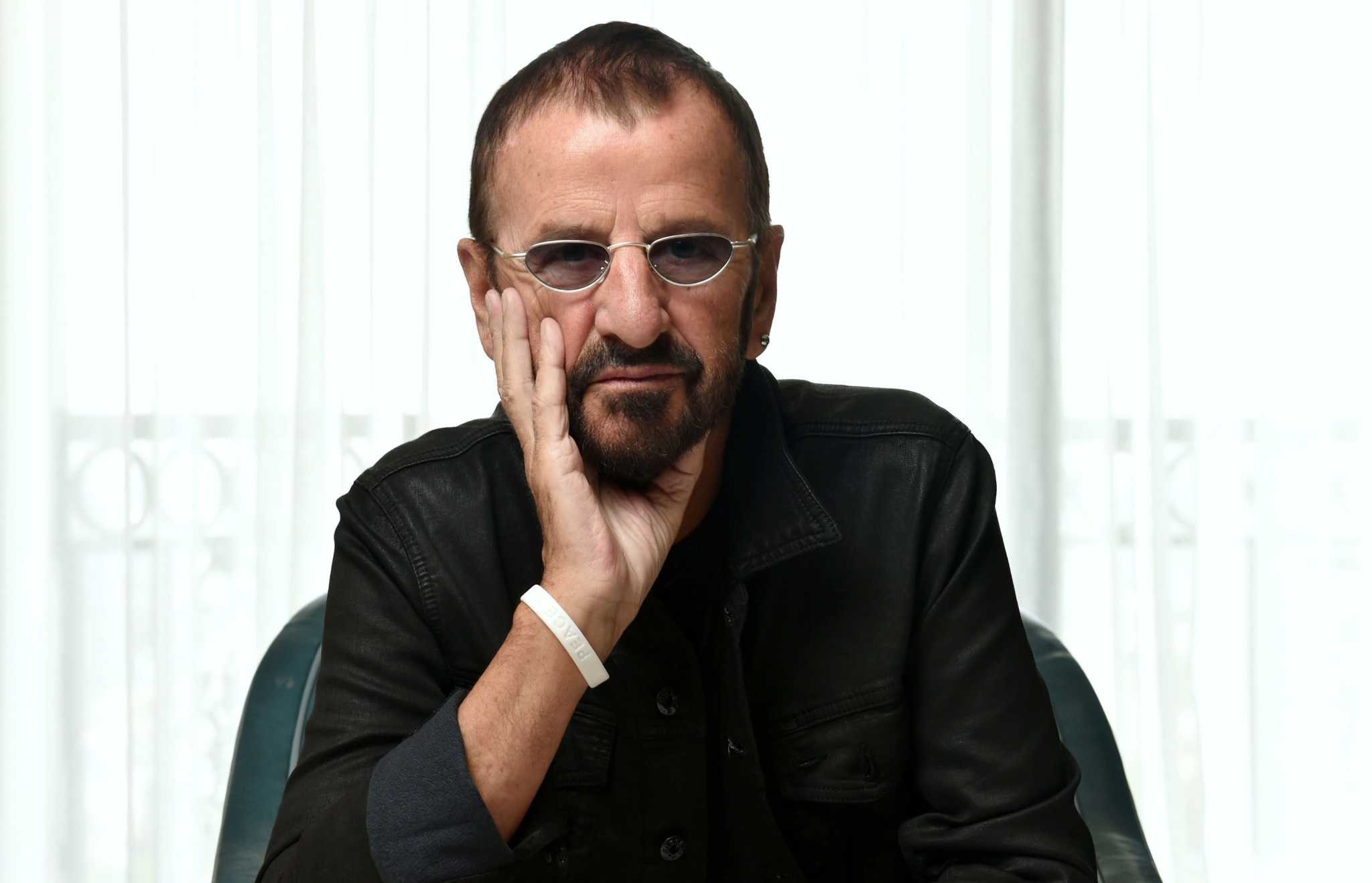 Ringo Starr being inducted into Rock and Roll Hall of Fame
