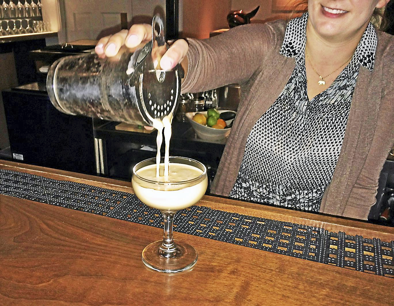 Local mixologist creating custom cocktails in Litchfield County