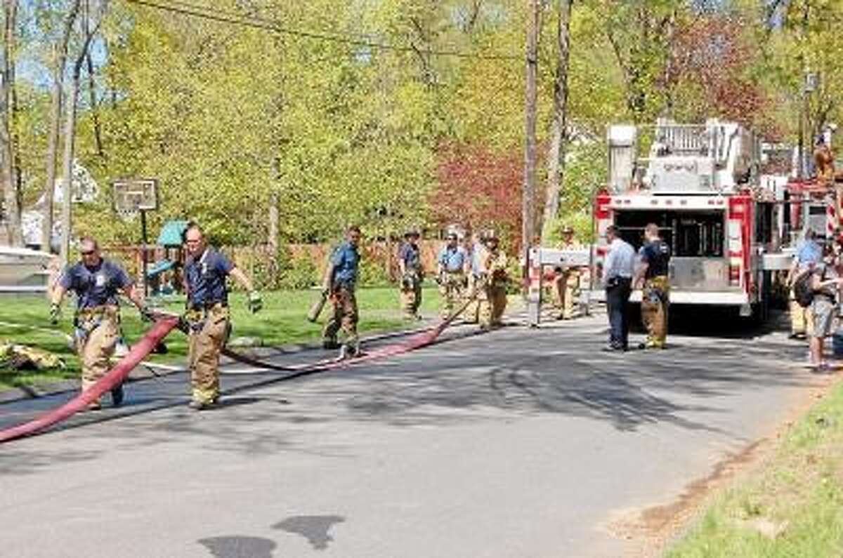 Two-alarm fire damages Torrington home