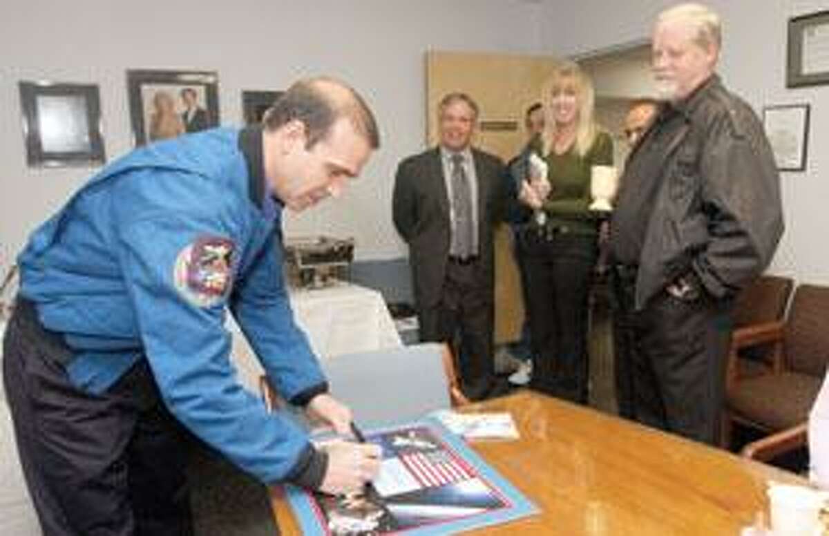 Astronaut visits local factory