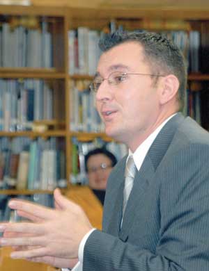 Who is new school chief Christopher Leone?