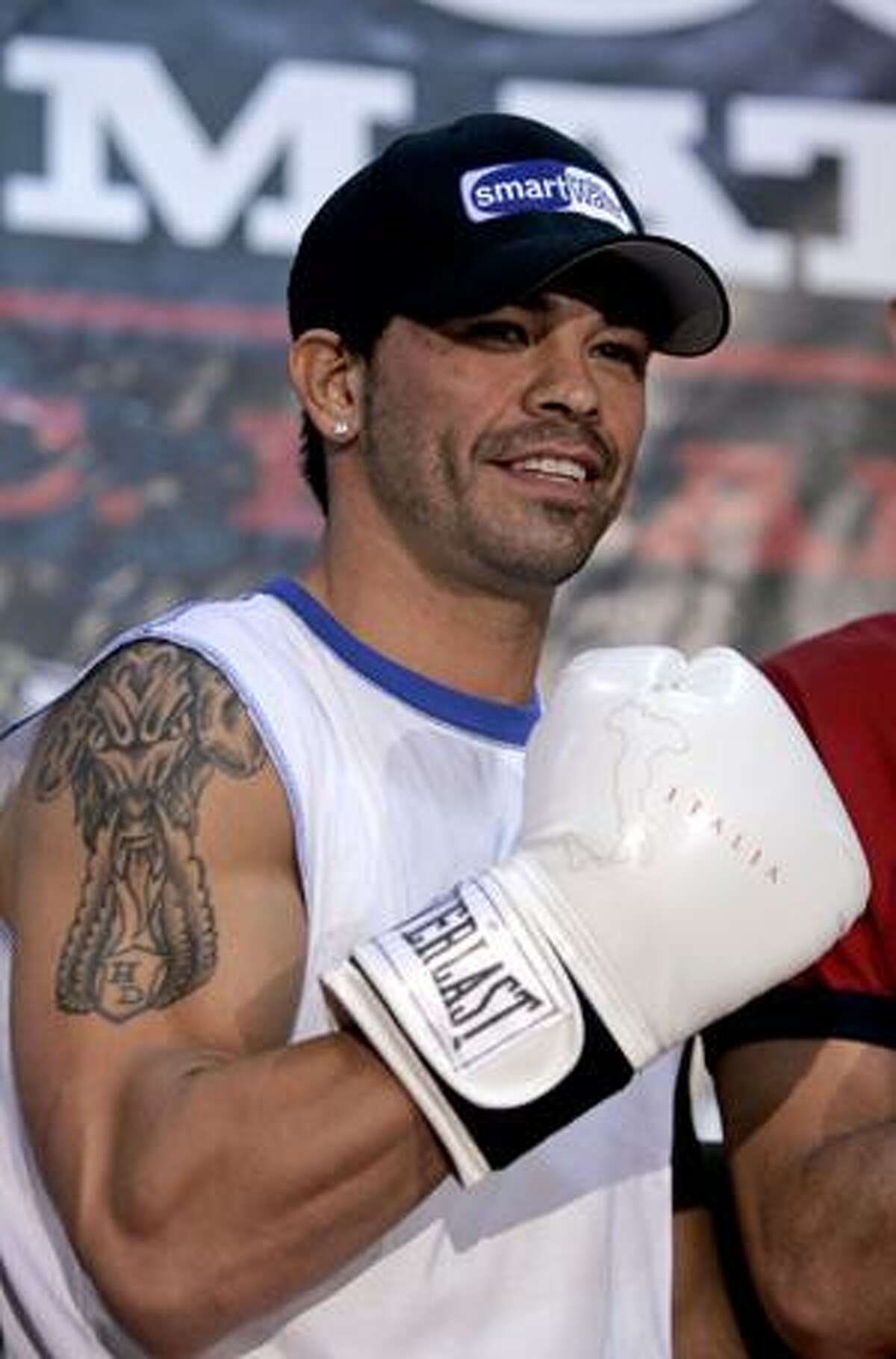Police accuse wife in death of boxing champ Gatti