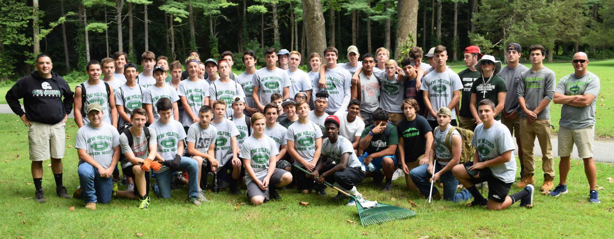 NMHS football team tackles cleanup chores