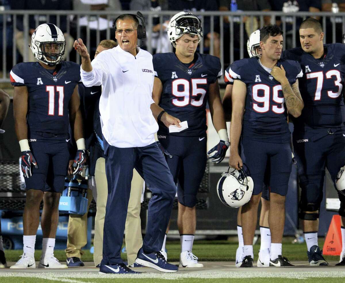 UConn football team comes from behind to beat Holy Cross