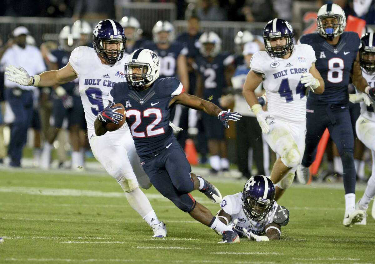 UConn football team comes from behind to beat Holy Cross