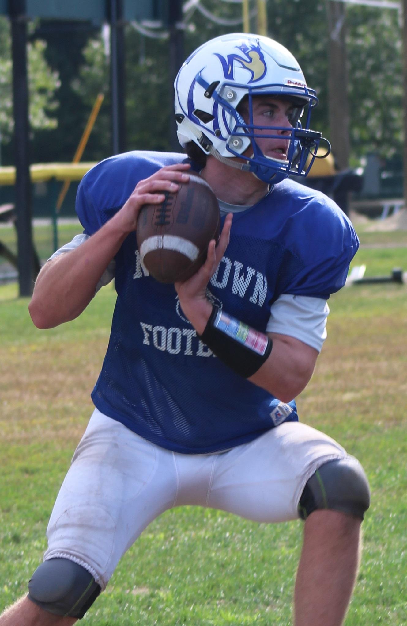 New coach, new faces, same expectations for Newtown football team