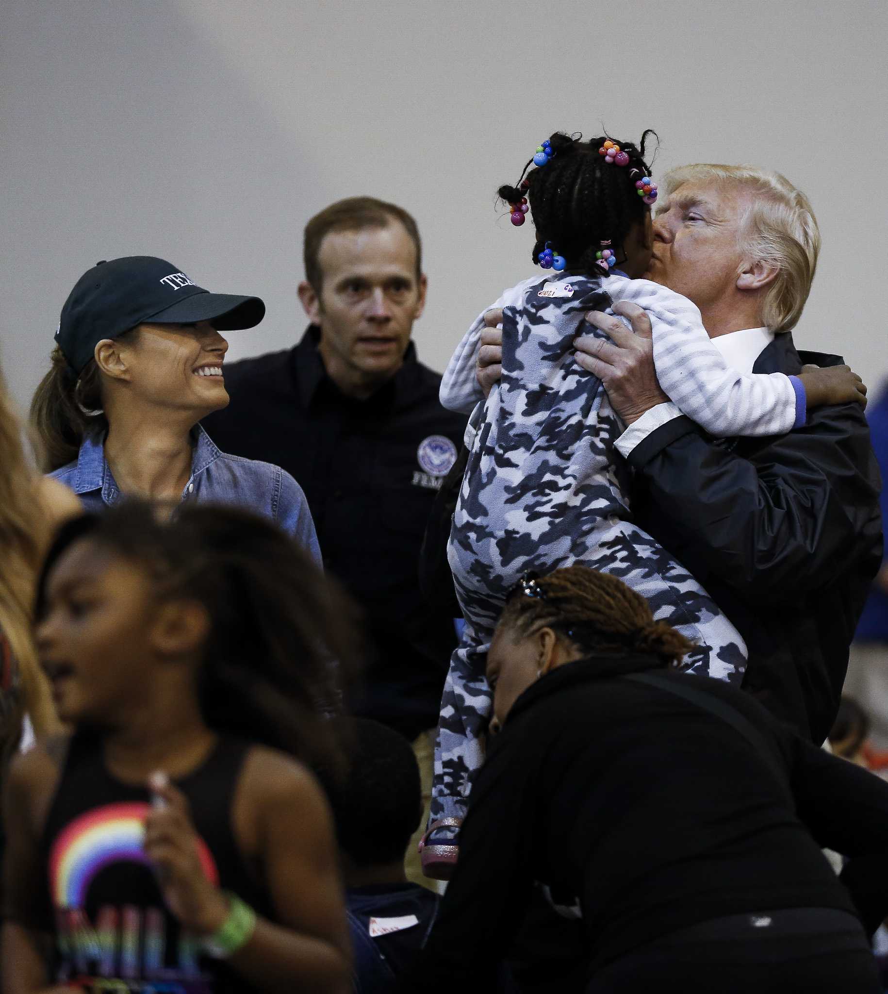 Trump visits Houston as comforter-in-chief