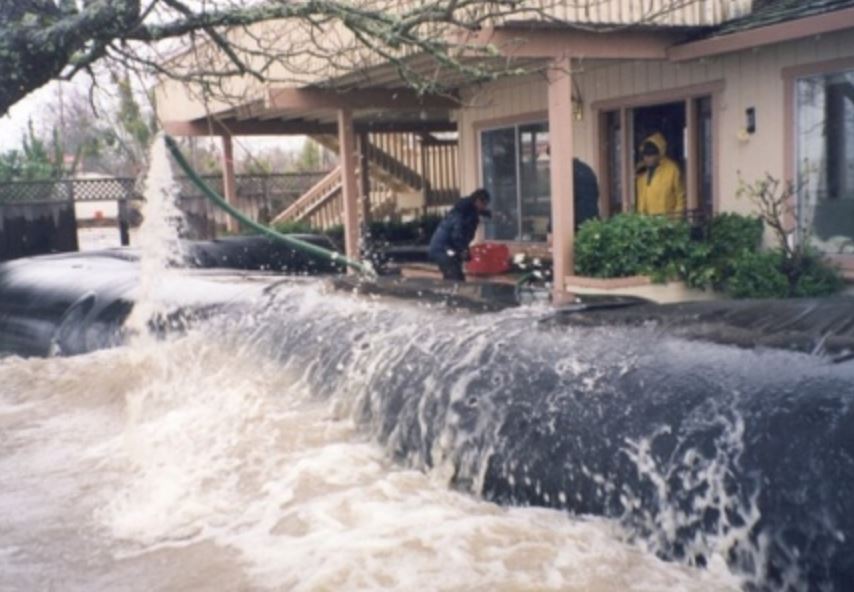 A portable dam may have saved a Houston-area family's Rosenberg home