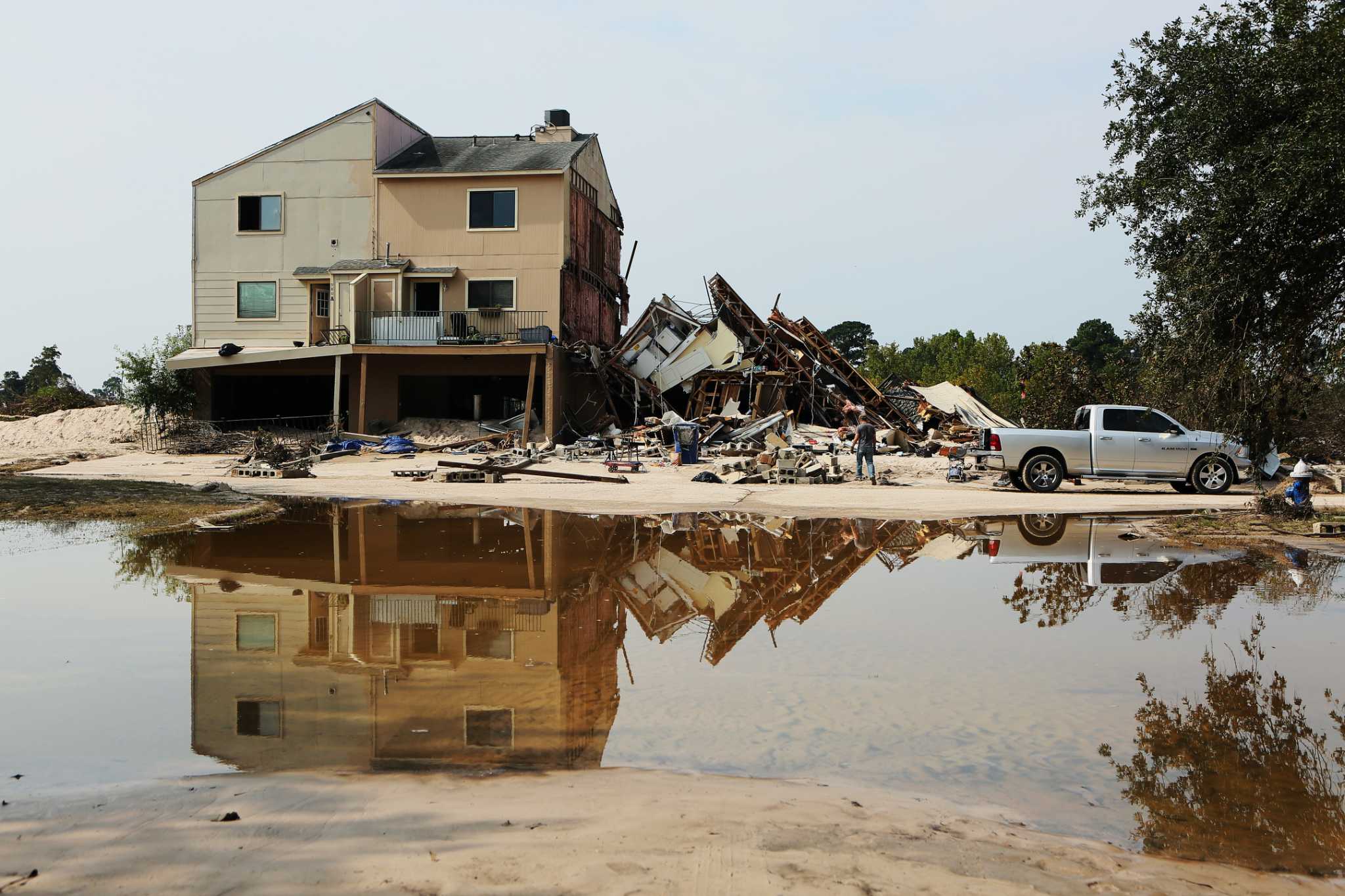 Force of raging waters carries away home, but not hope