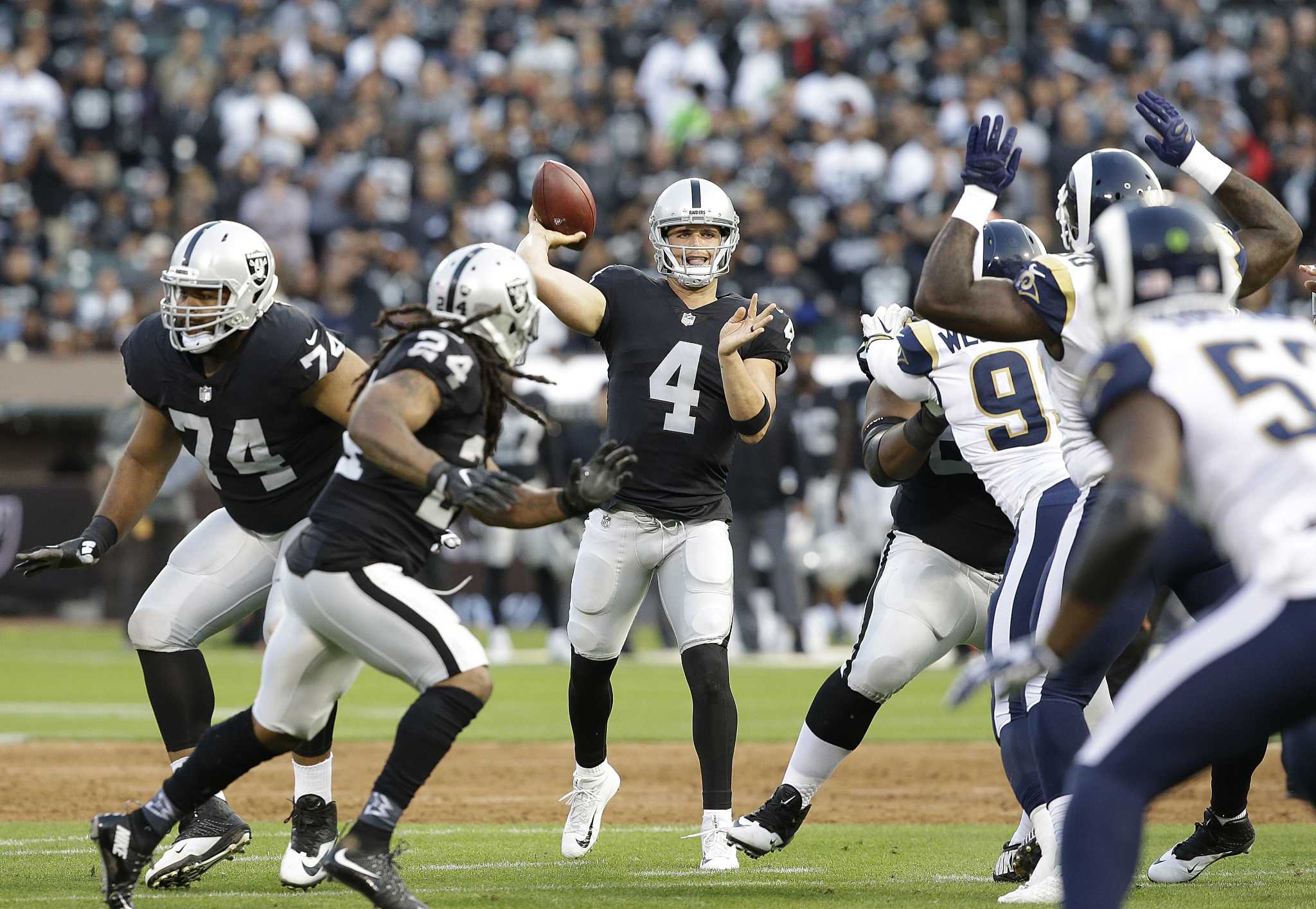 Raiders' Carr still growing as a quarterback