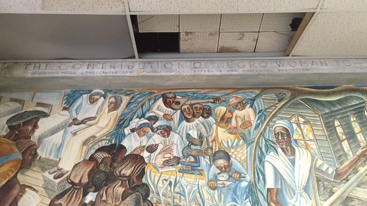 Historic John Biggers' mural in Houston scarred by mold from Harvey damage