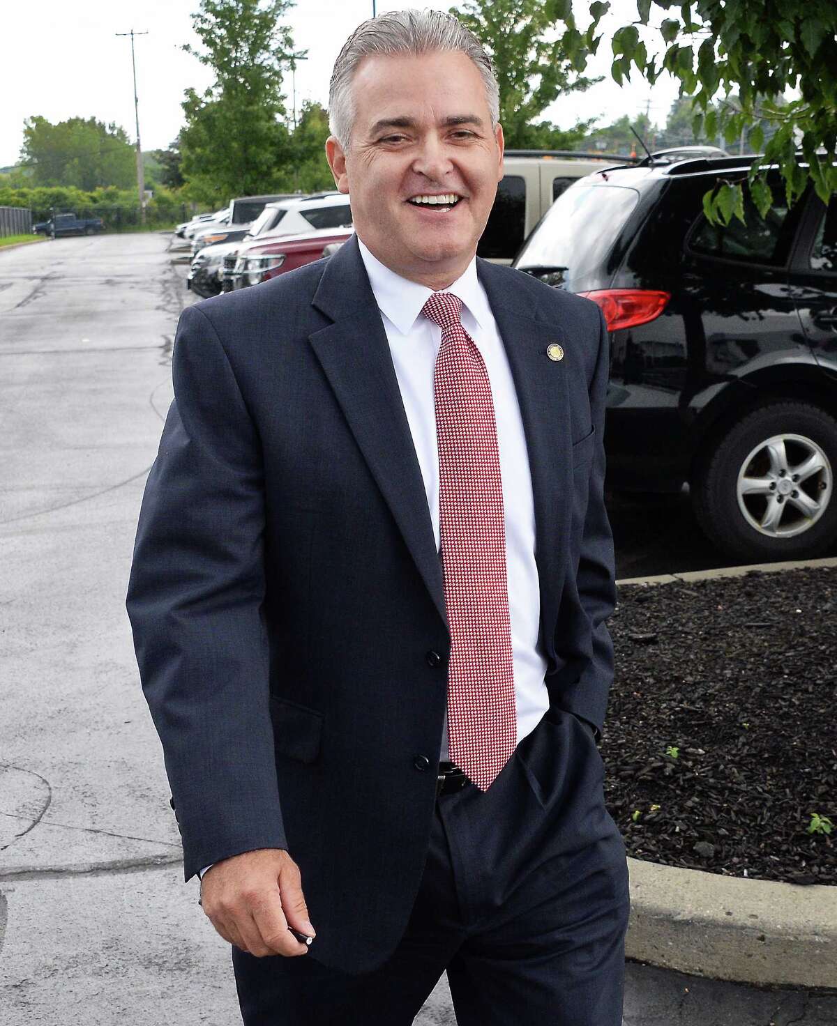 McLaughlin's aide threatened state worker's job