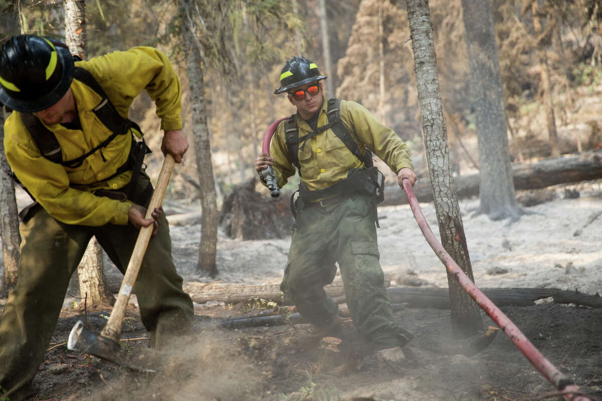 Weather helps Norse Peak Fire but long, slow burn ahead