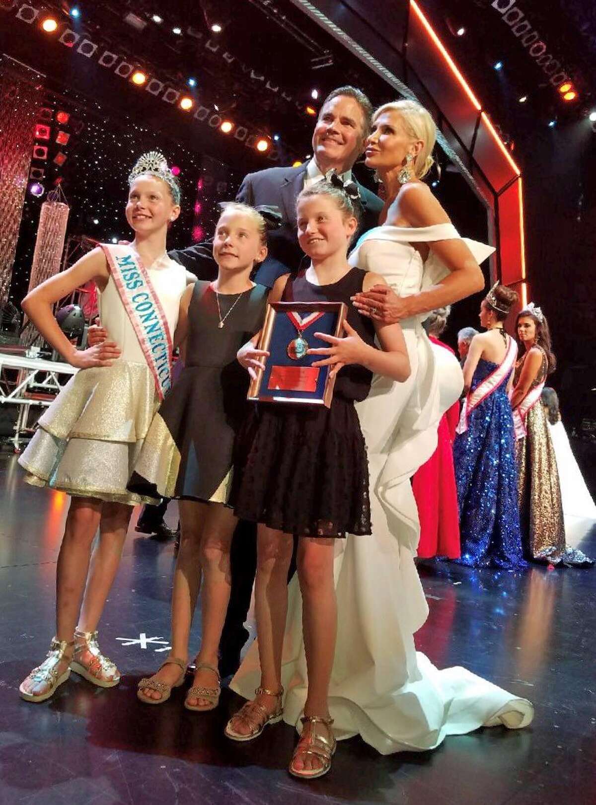 Mrs. Connecticut puts her title to use