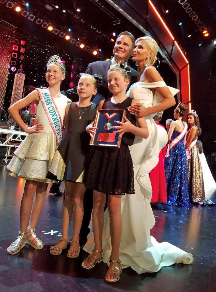 Mrs. Connecticut puts her title to use