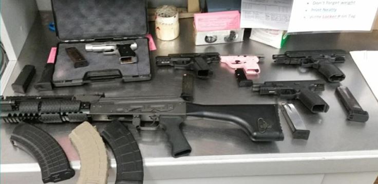 Drugs, cash and guns seized in south Laredo home raid that nets 2 arrests