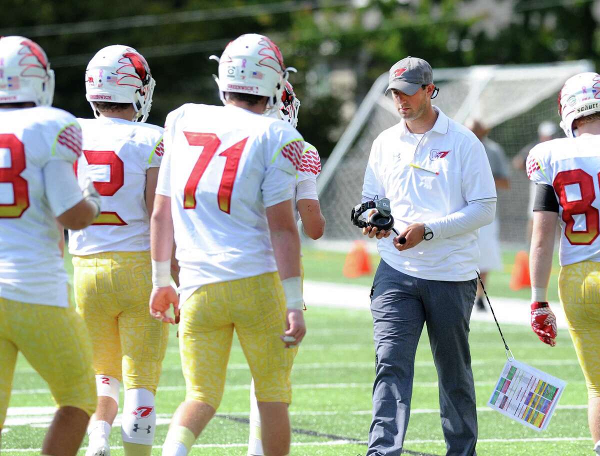 Greenwich football team downs Trinity Catholic, improves to 2-0