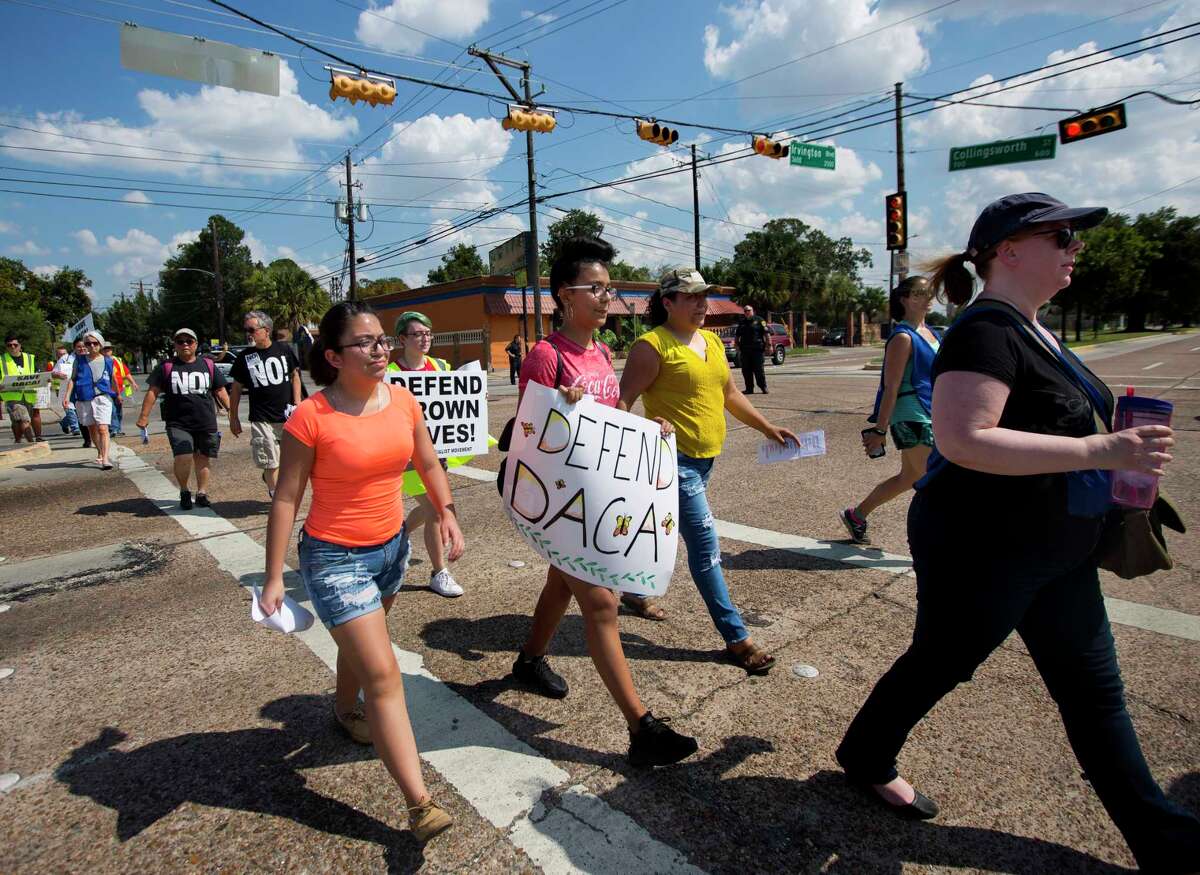 Activists march in support of young immigrants, DACA