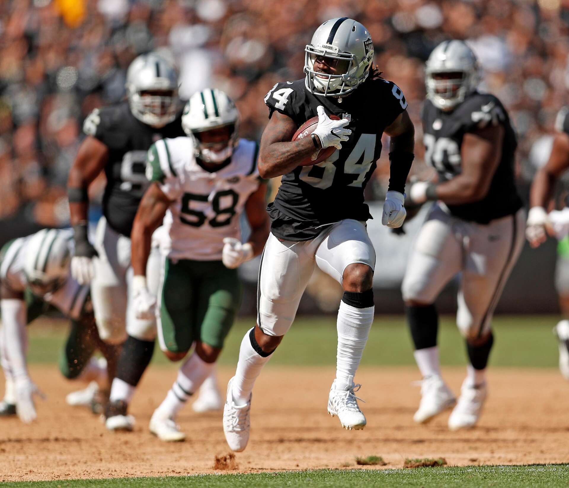 Michael Crabtree propels Raiders to easy win over Jets