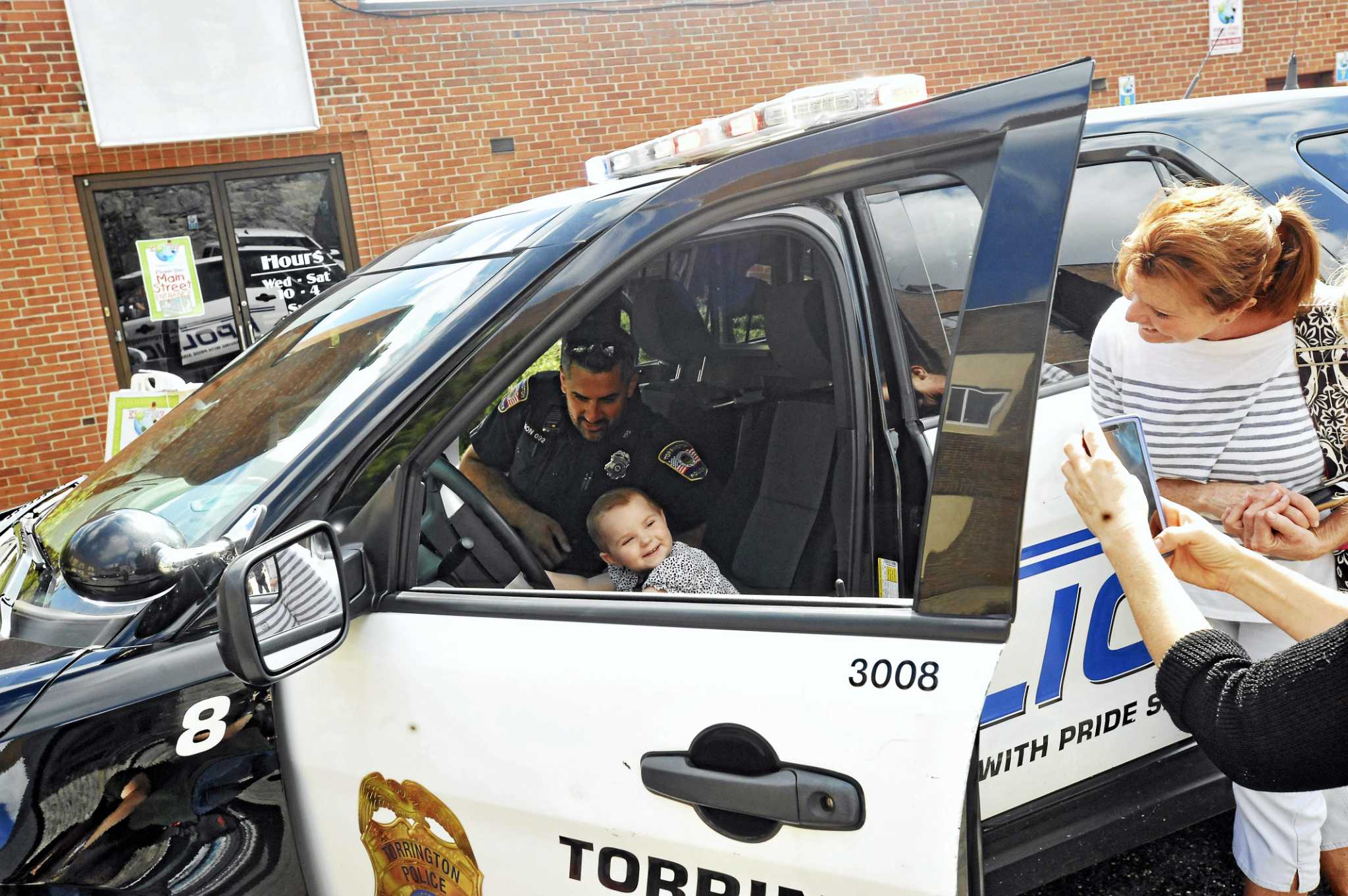 Torrington officers have morning of fun with children at KidsPlay