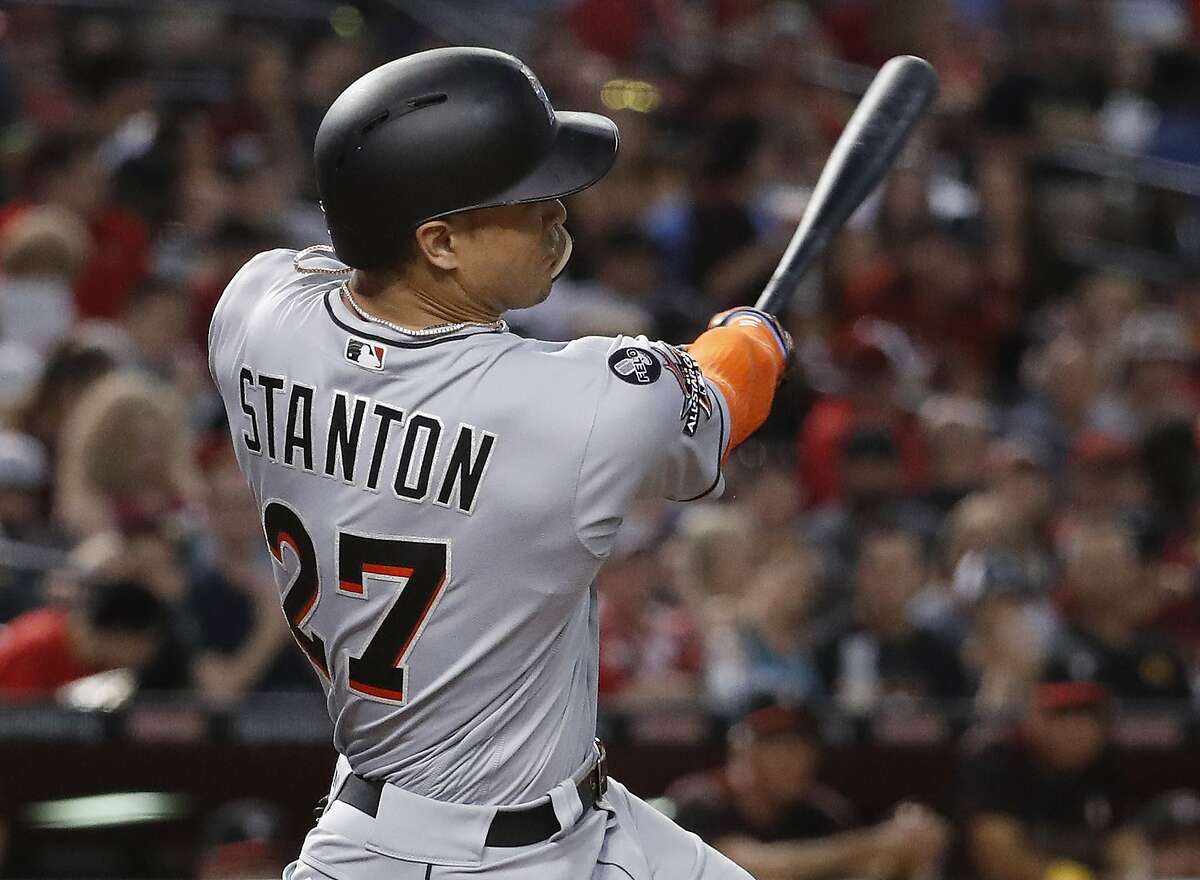 Giancarlo Stanton has the Giants, and all of baseball, playing waiting game