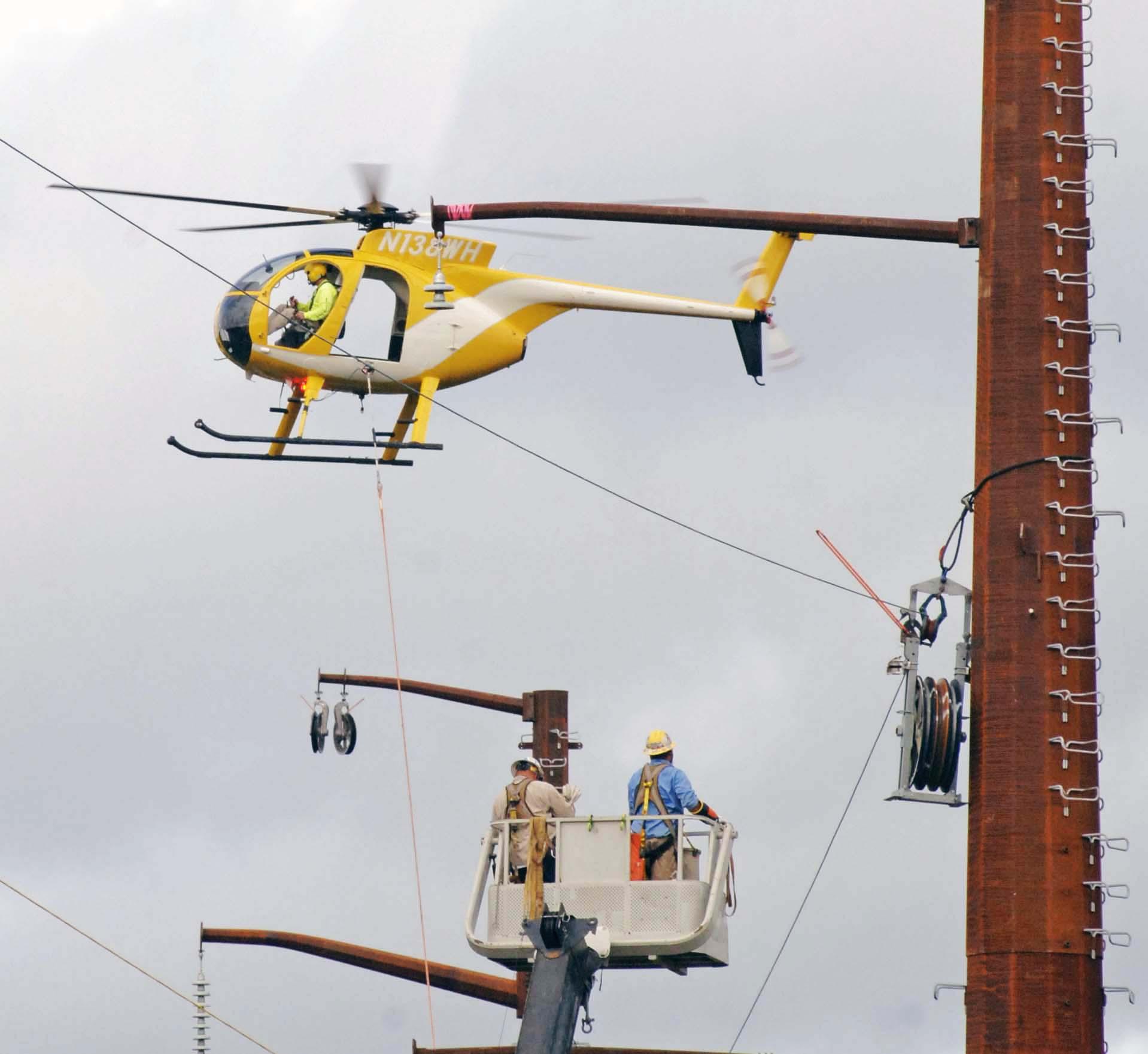 Helicopters used to string power lines in region