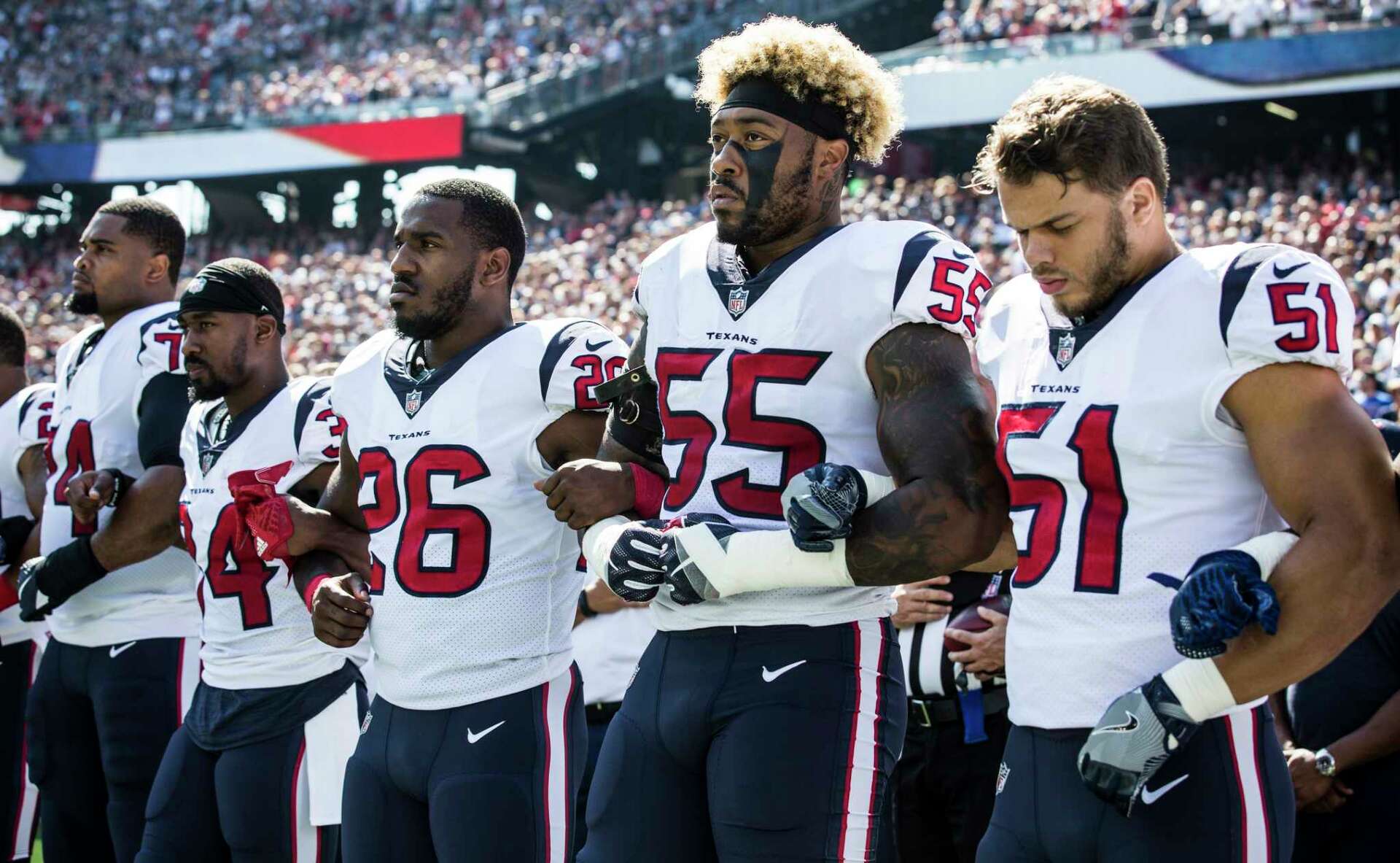 Local high school football players kicked off team after protest during ...