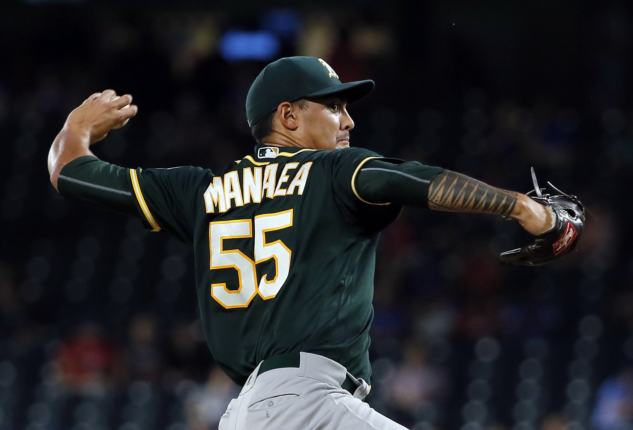 Sean Manaea wins at Texas, says weight loss affected season