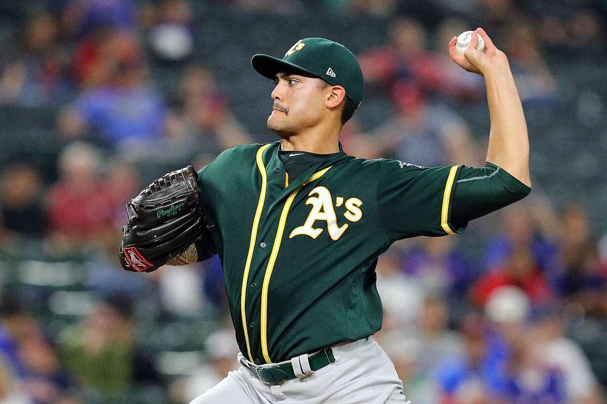 Sean Manaea wins at Texas, says weight loss affected season