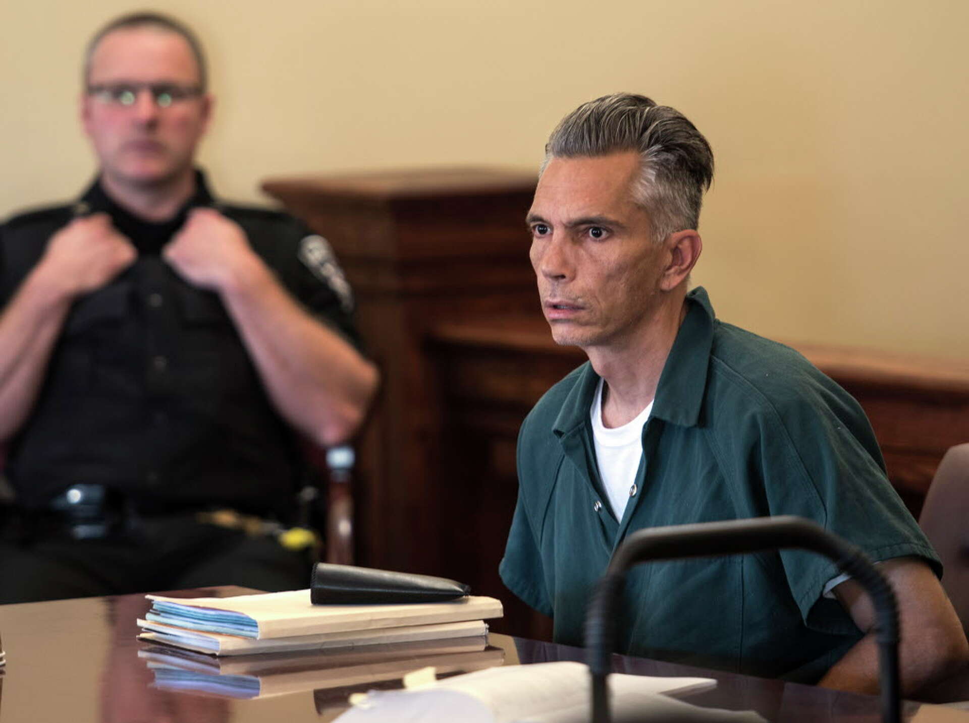 Judge dismisses conviction in 1986 Troy arson, double murder