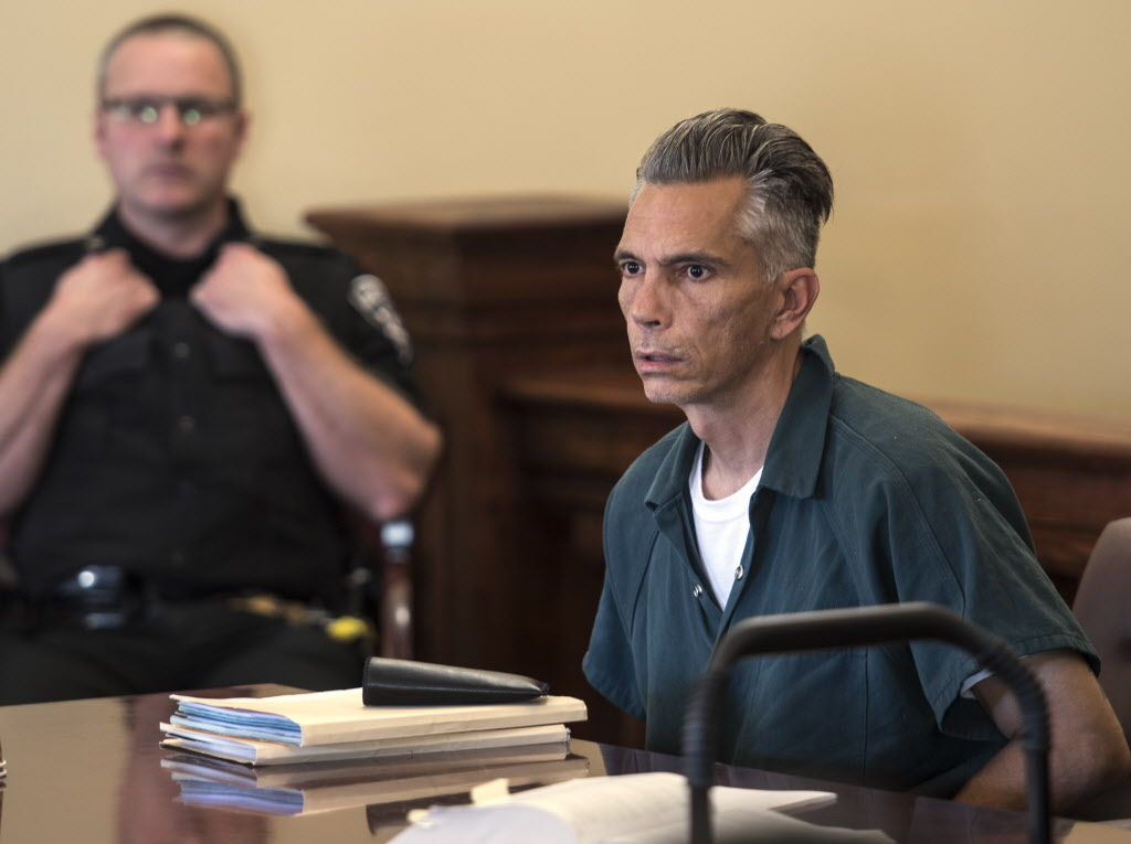 Judge dismisses conviction in 1986 Troy arson, double murder