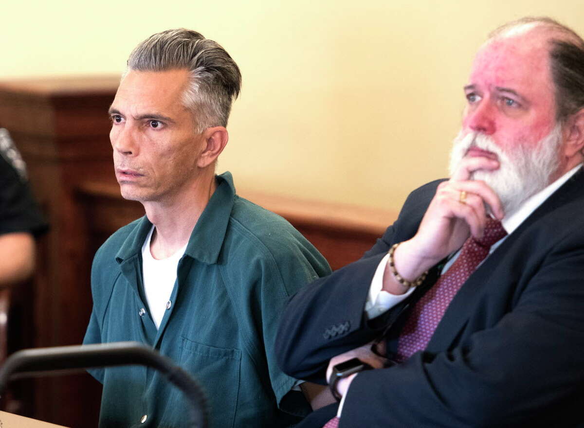 Judge dismisses conviction in 1986 Troy arson, double murder