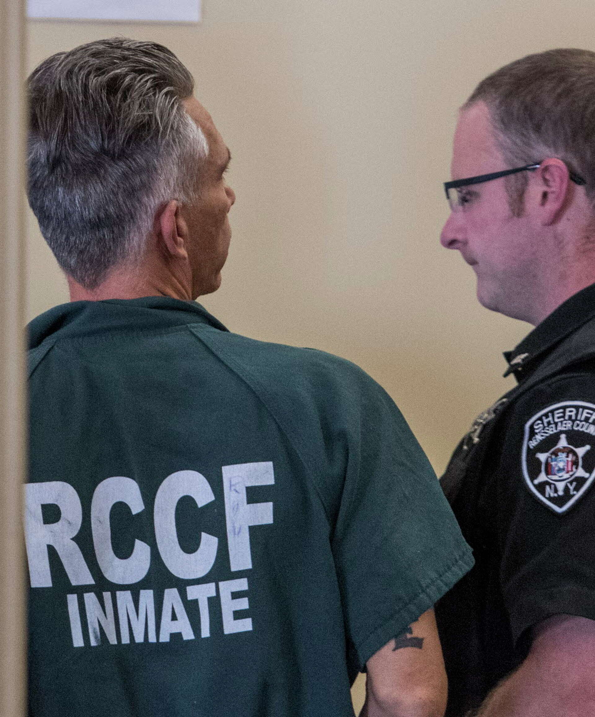 Judge dismisses conviction in 1986 Troy arson, double murder