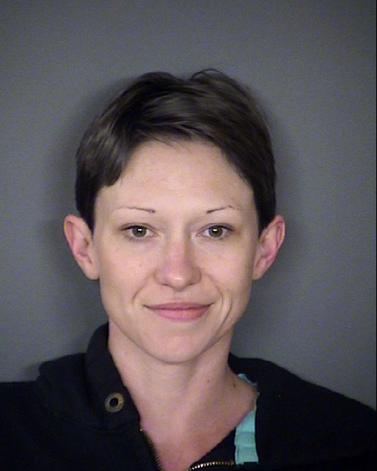 Woman arrested after allegedly leaving purse, ID, meth behind in hotel room
