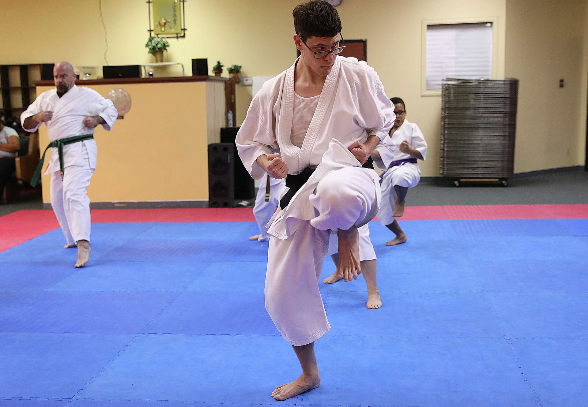 He's got the chops: 21-year-old with autism earns second-degree karate ...