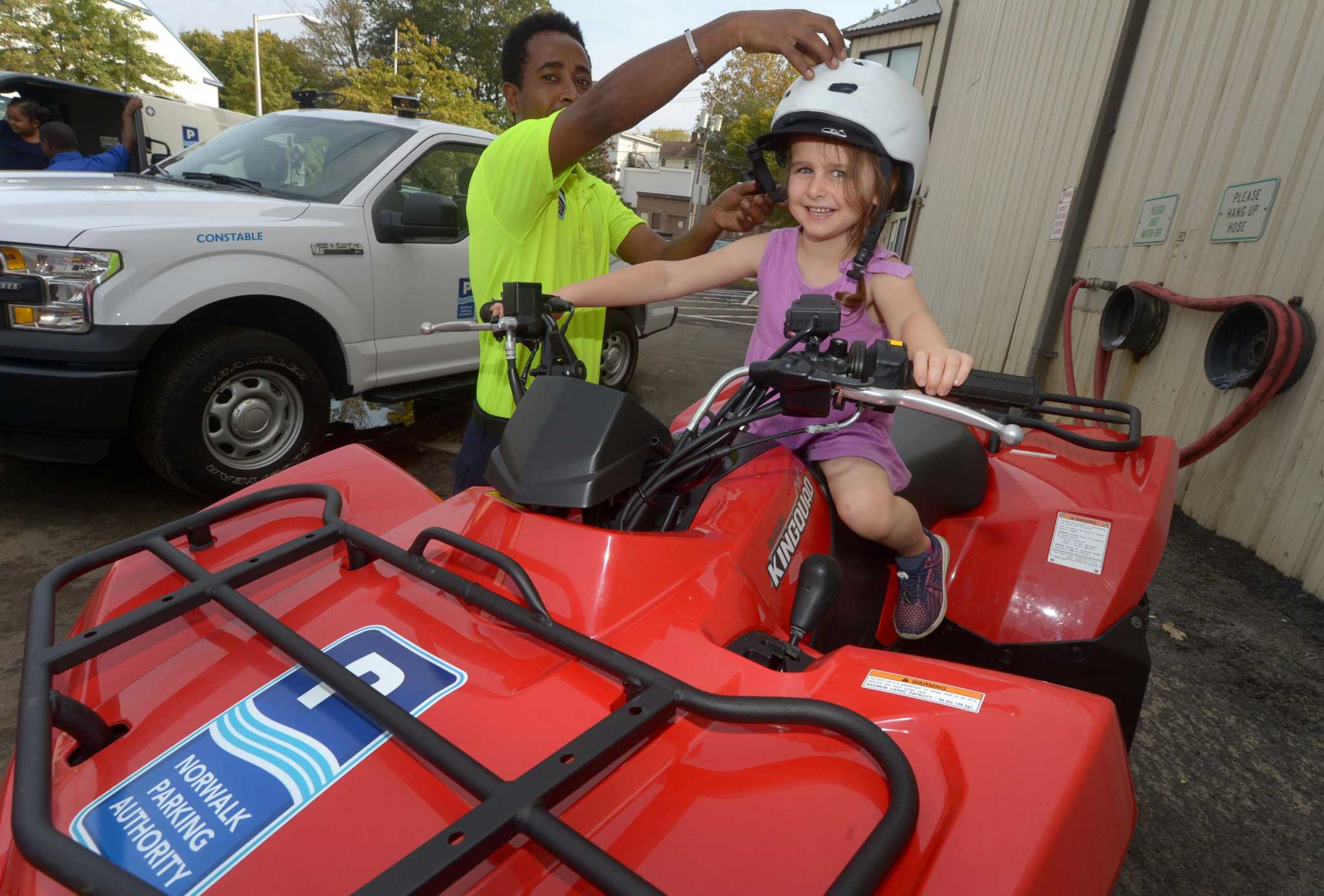 In Photos: Kids go for a whirl in fire, police, EMS rescue vehicles