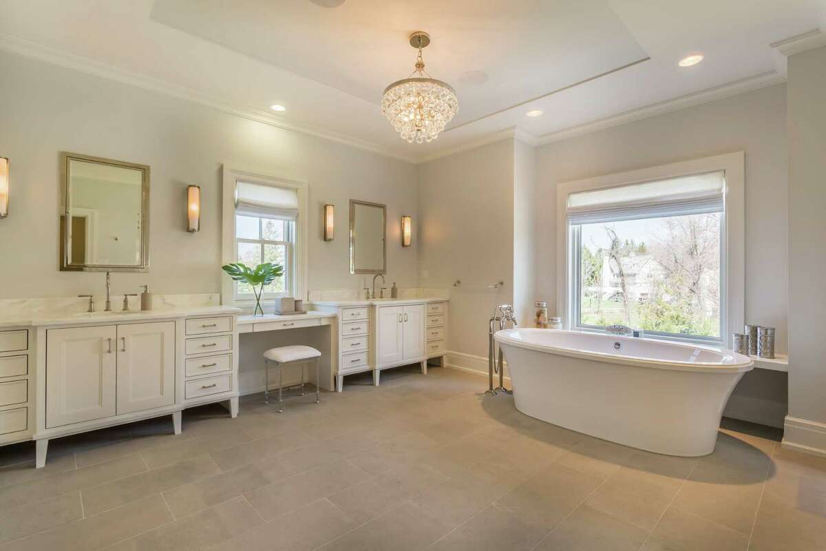 On the Market / Front porch welcoming entry point for Westport mansion