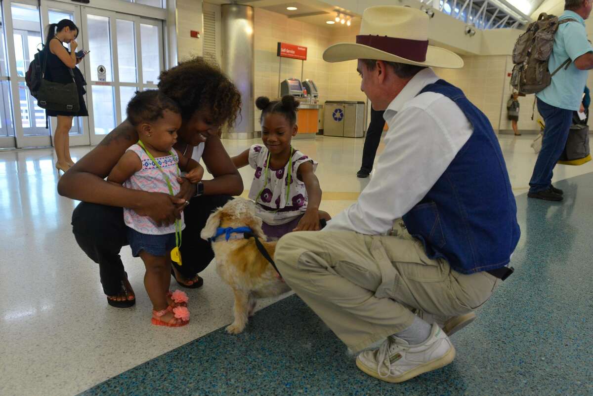 Pups and Planes initiative plays big part of Airport Ambassadors program