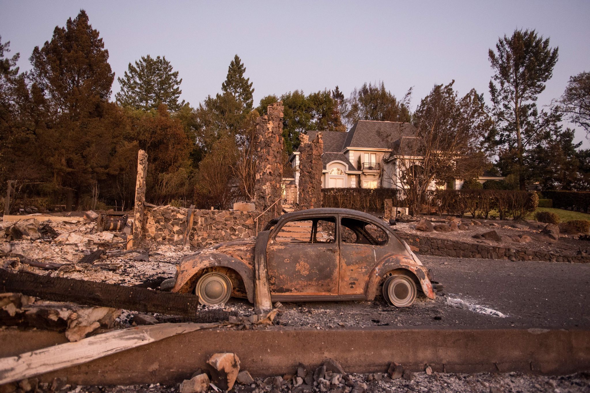 Photos show how close some homeowners came to losing their homes