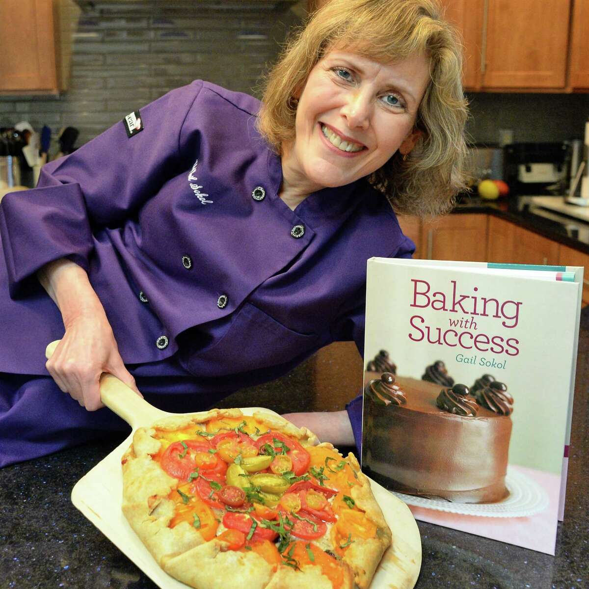 Local cooking teacher offers baking wisdom in new book
