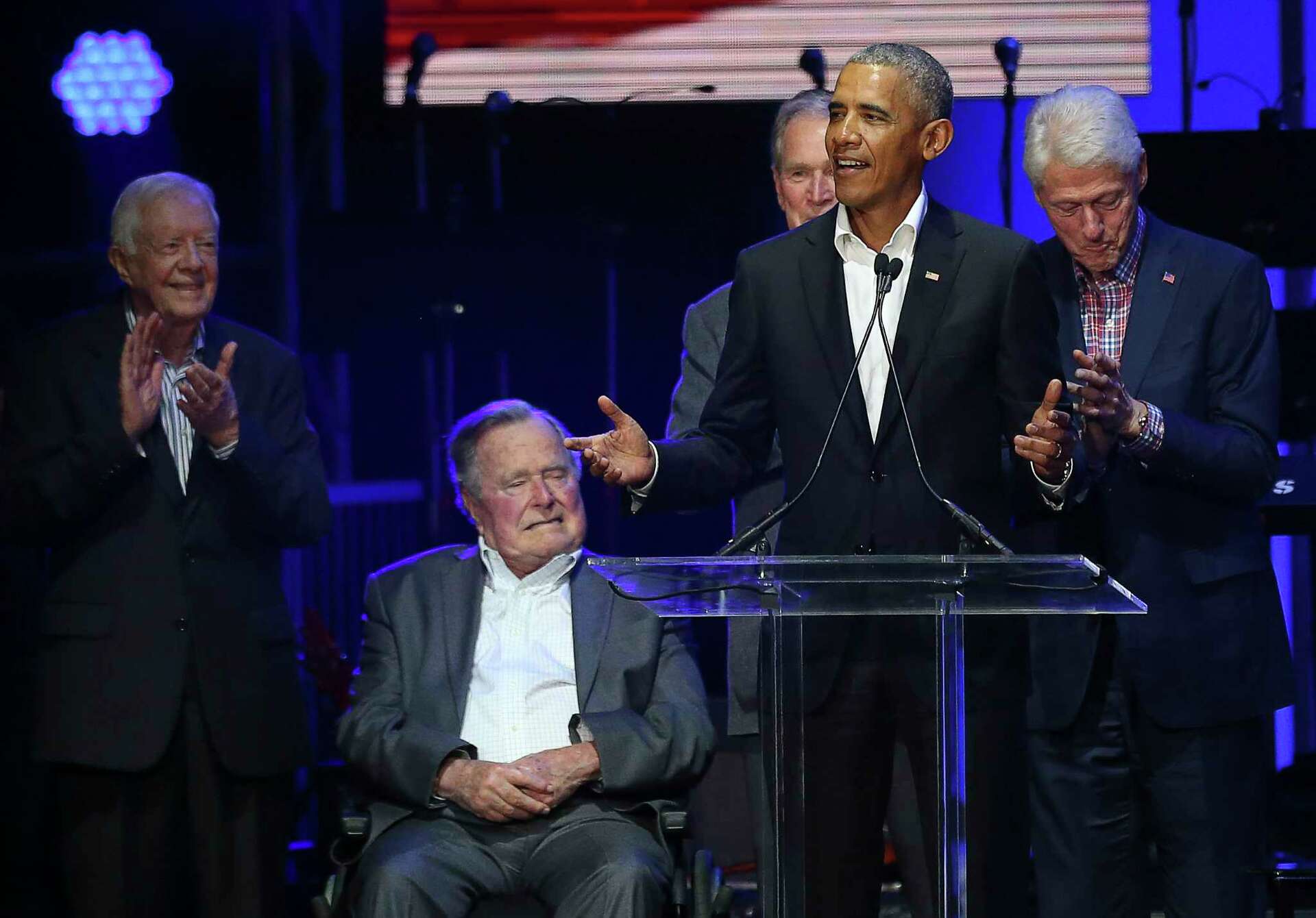 Former president George W. Bush, accompanied by dad, to throw out first ...