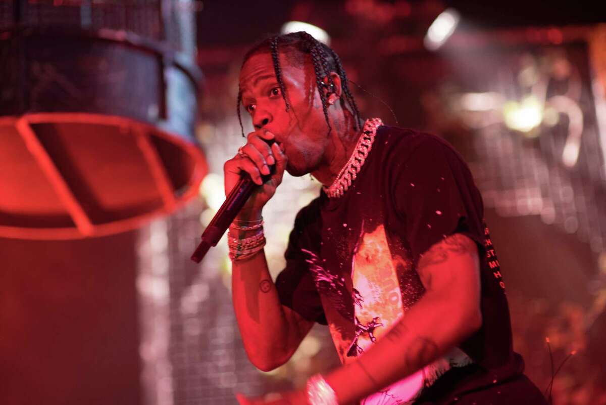 There's a huge gold Travis Scott head outside Cactus Music