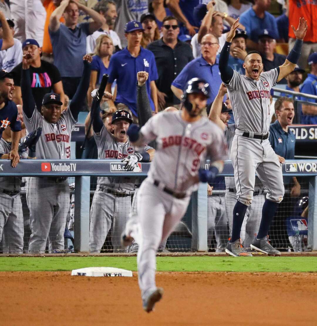 Marwin Gonzalez points to 'Houston Strong' patch after tying HR