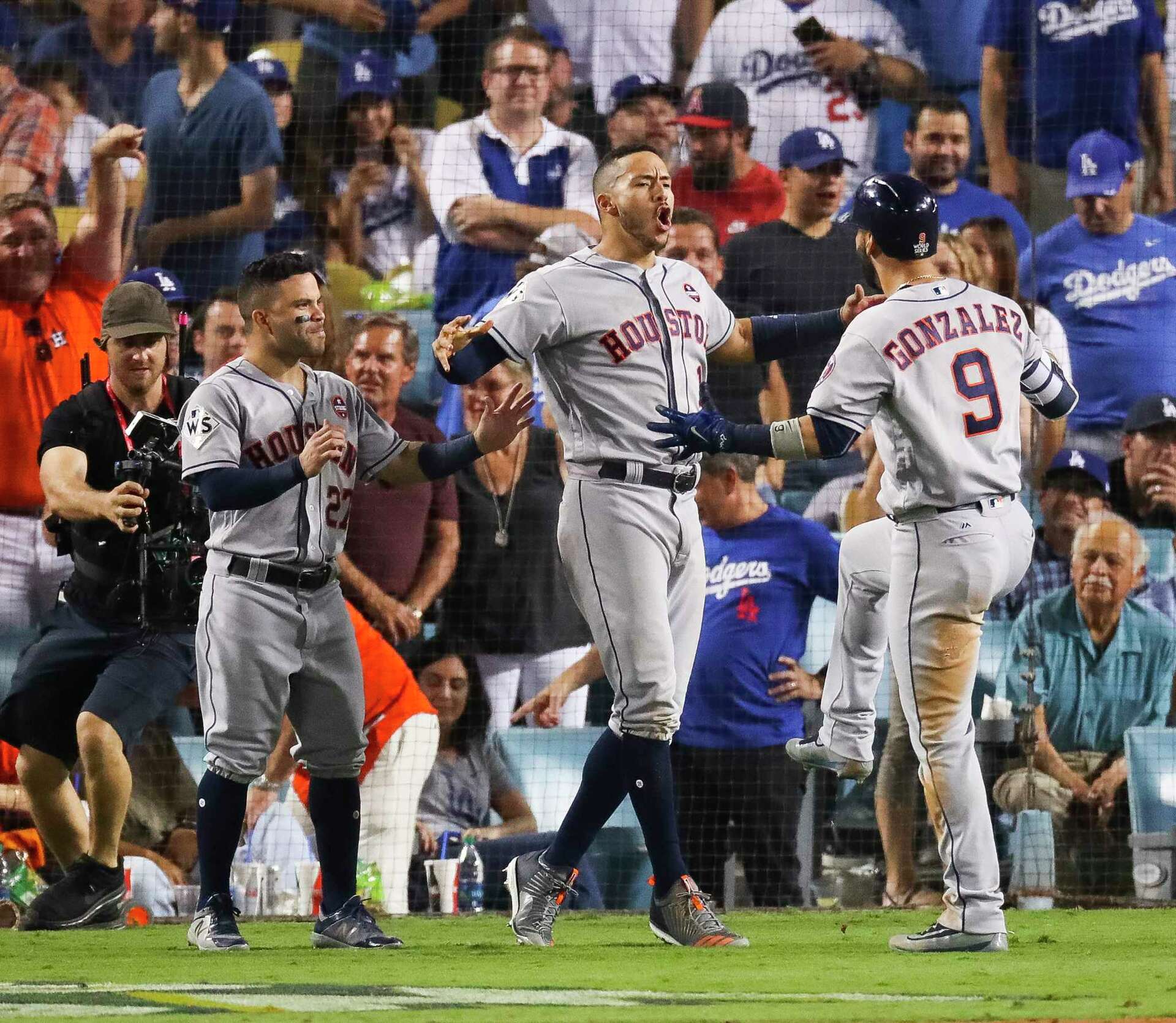Marwin Gonzalez points to 'Houston Strong' patch after tying HR
