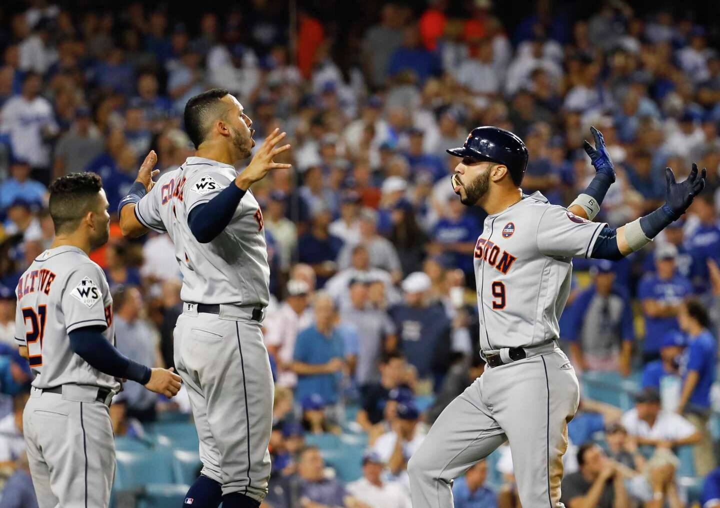 Marwin Gonzalez points to 'Houston Strong' patch after tying HR